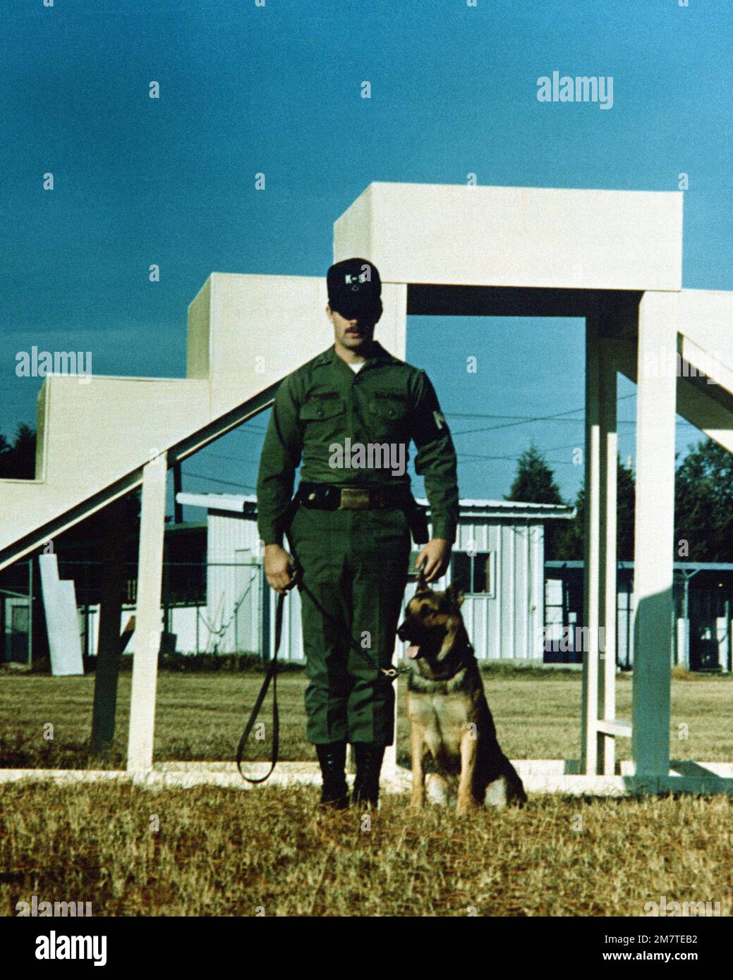 SPC Timothy Zimmerman and his dog "Starbuck", of the 16th Military ...