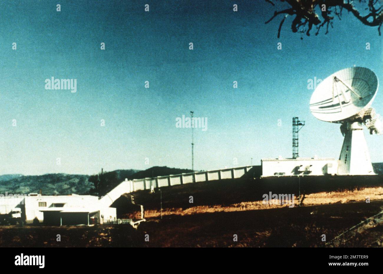 A view of the radar dish antenna and other facilities in the Air Force ...