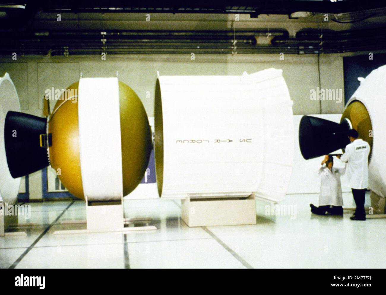 A view of a missile lying in disconnected parts on display. Country ...