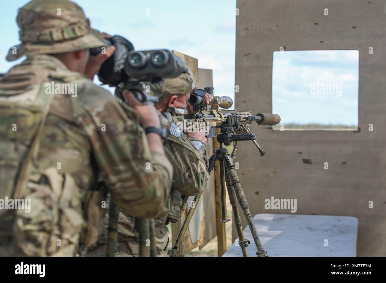 U.S. Army Sgt. John Barrett, a sniper assigned to 3rd Battalion, 66th ...