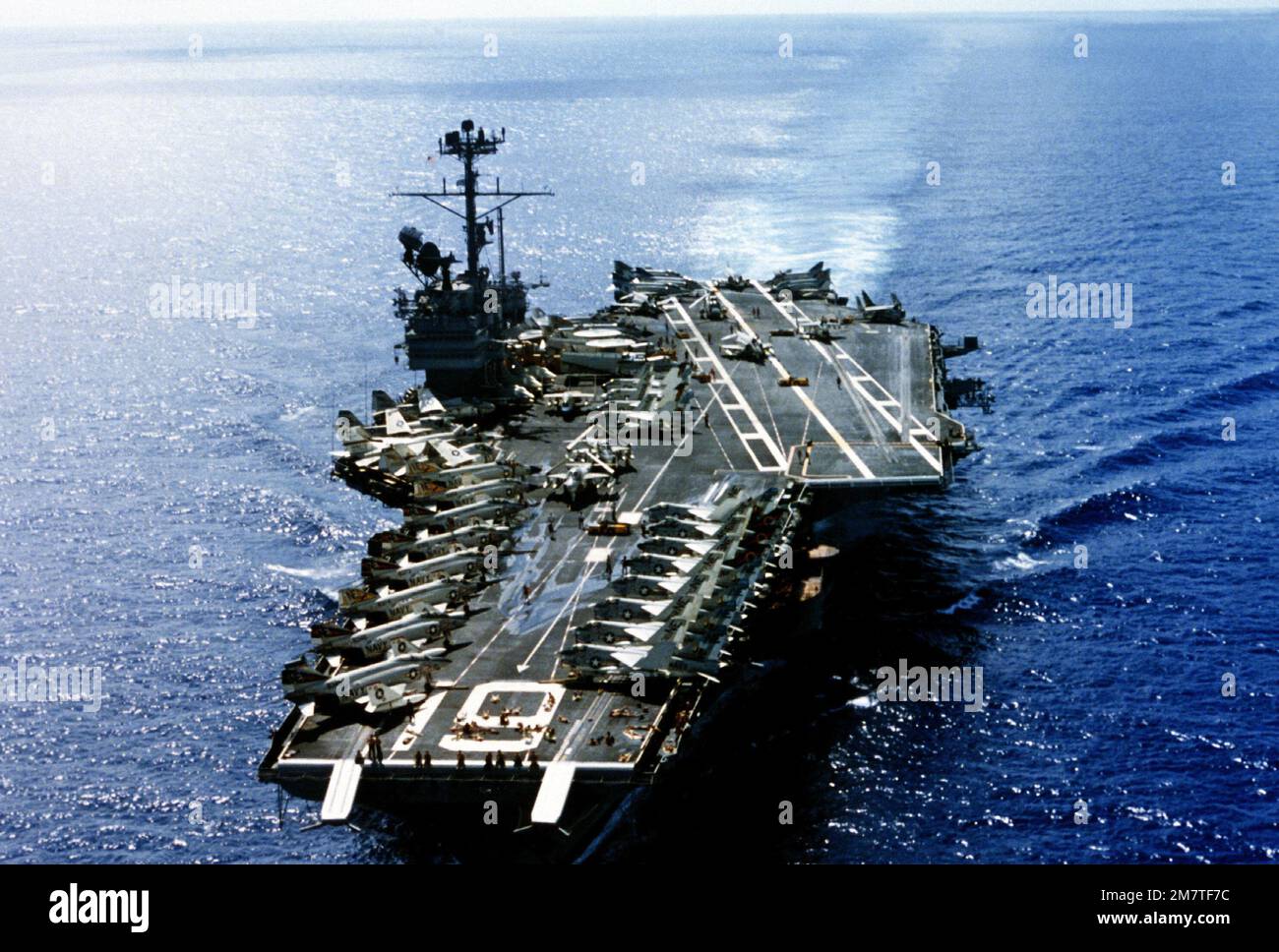 A bow view of the aircraft carrier USS RANGER (CV-61), equipped with ...