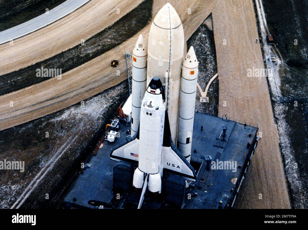 An aerial view of the rocket booster-mounted Columbia space shuttle ...