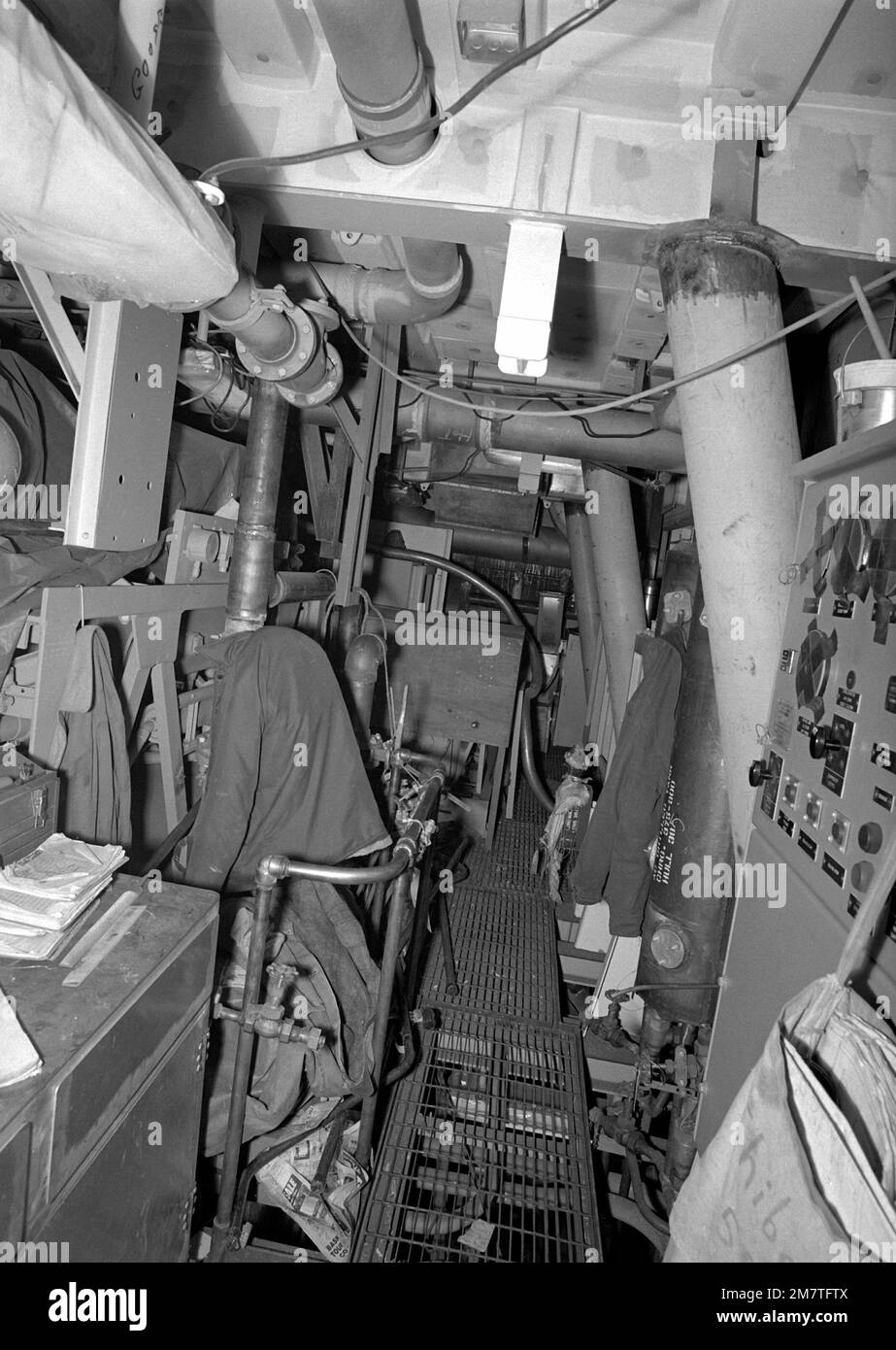 The lower level engine room aboard the guided missile frigate DOYLE ...