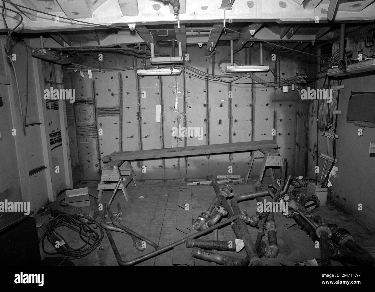 The helicopter hauldown and traverse machinery room aboard the guided ...