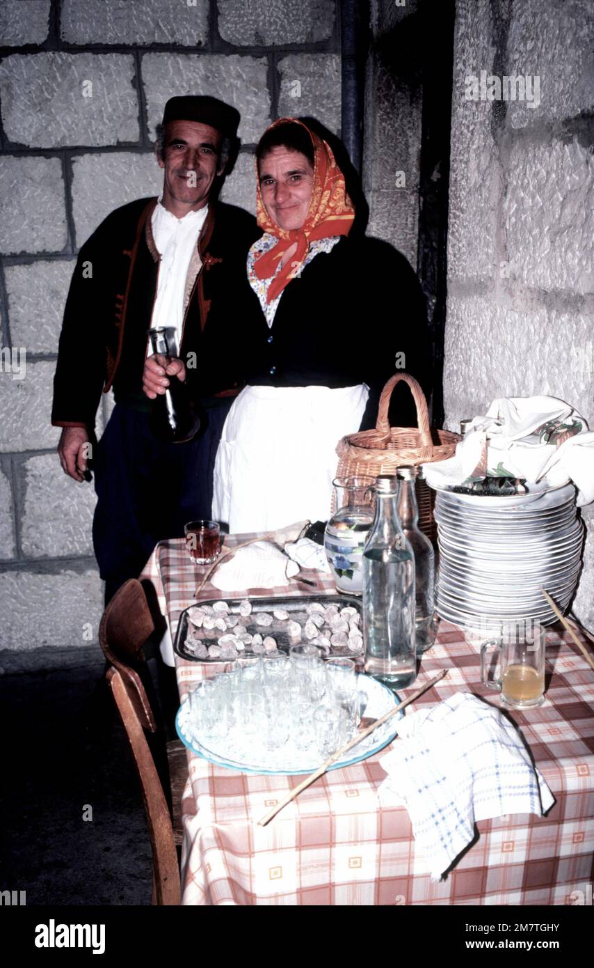 Yugoslavian hosts prepare to serve traditional food and drink to 6th ...