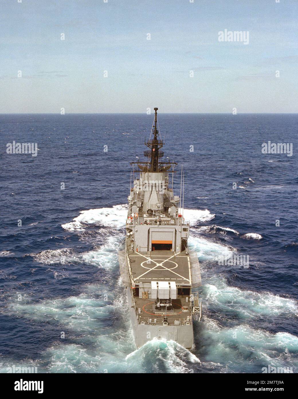 Aerial stern view of the frigate USS KNOX (FF-1052) underway off the ...