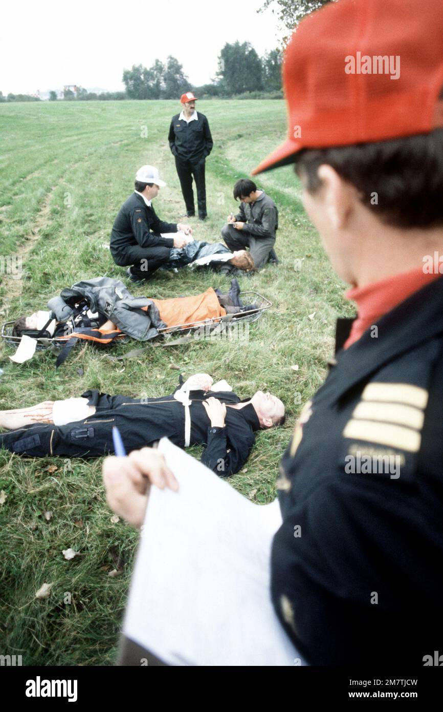 Sarex '81 participants diagnose and treat an "aircraft crash victim ...