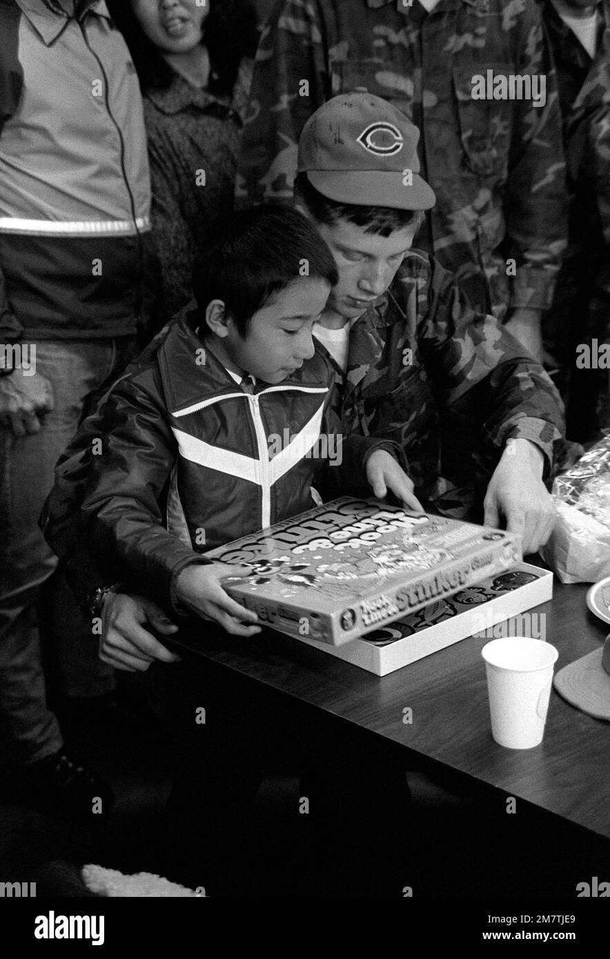 Family giving gifts Black and White Stock Photos & Images - Alamy
