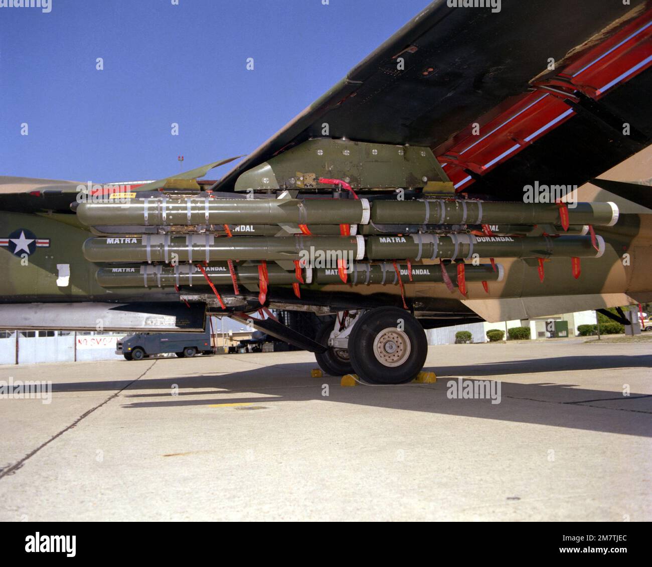 A view of Durandal Concrete Penetration Missiles mounted on an F-111 ...