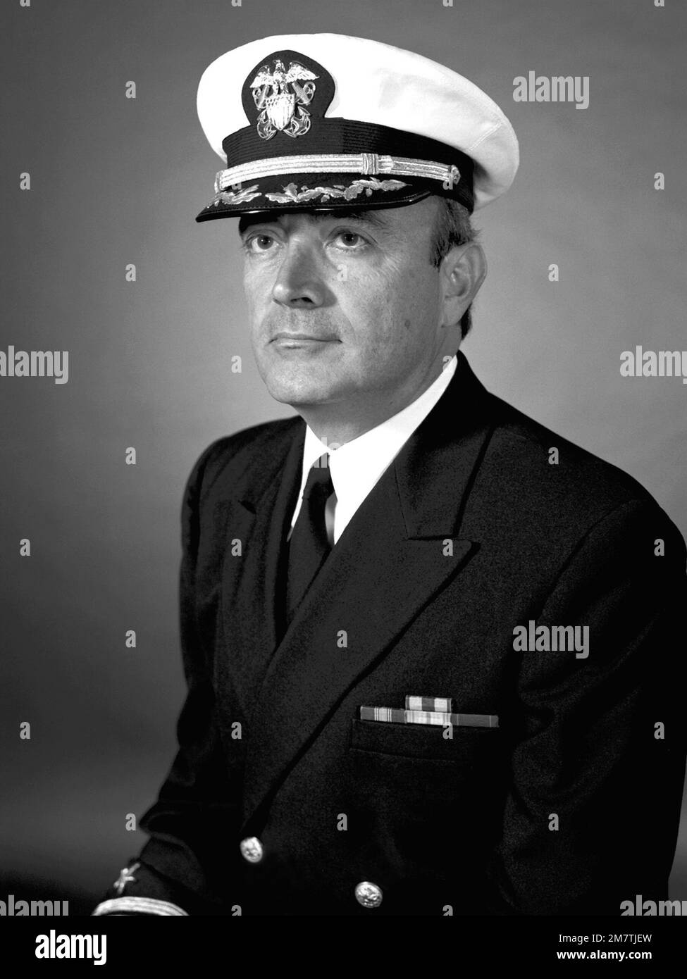 CDR Alfred F. Interian, USN (covered). Country: Unknown Stock Photo - Alamy