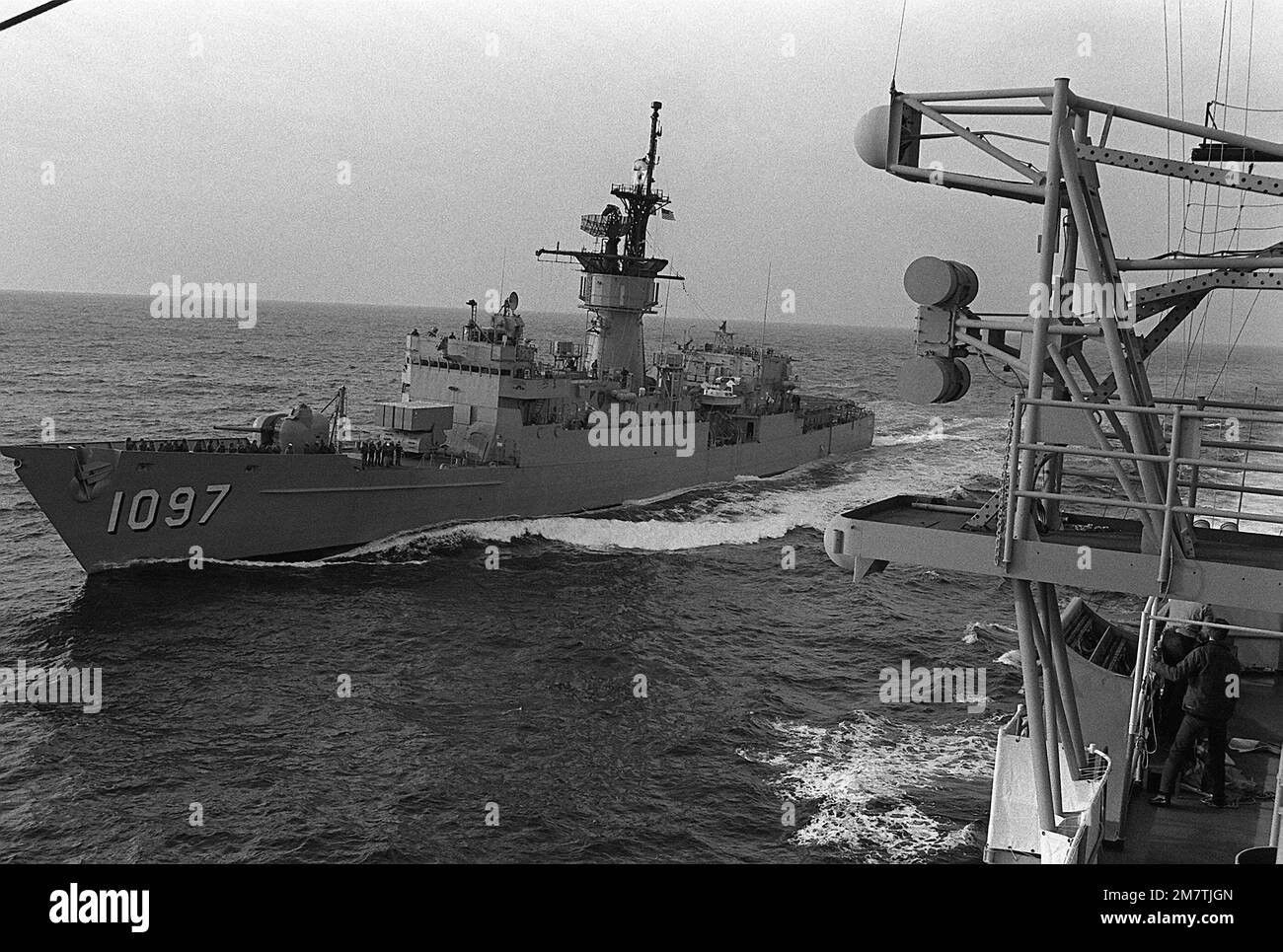 A port bow view of the USS MOINESTER (FF-1097), taken from the guided ...