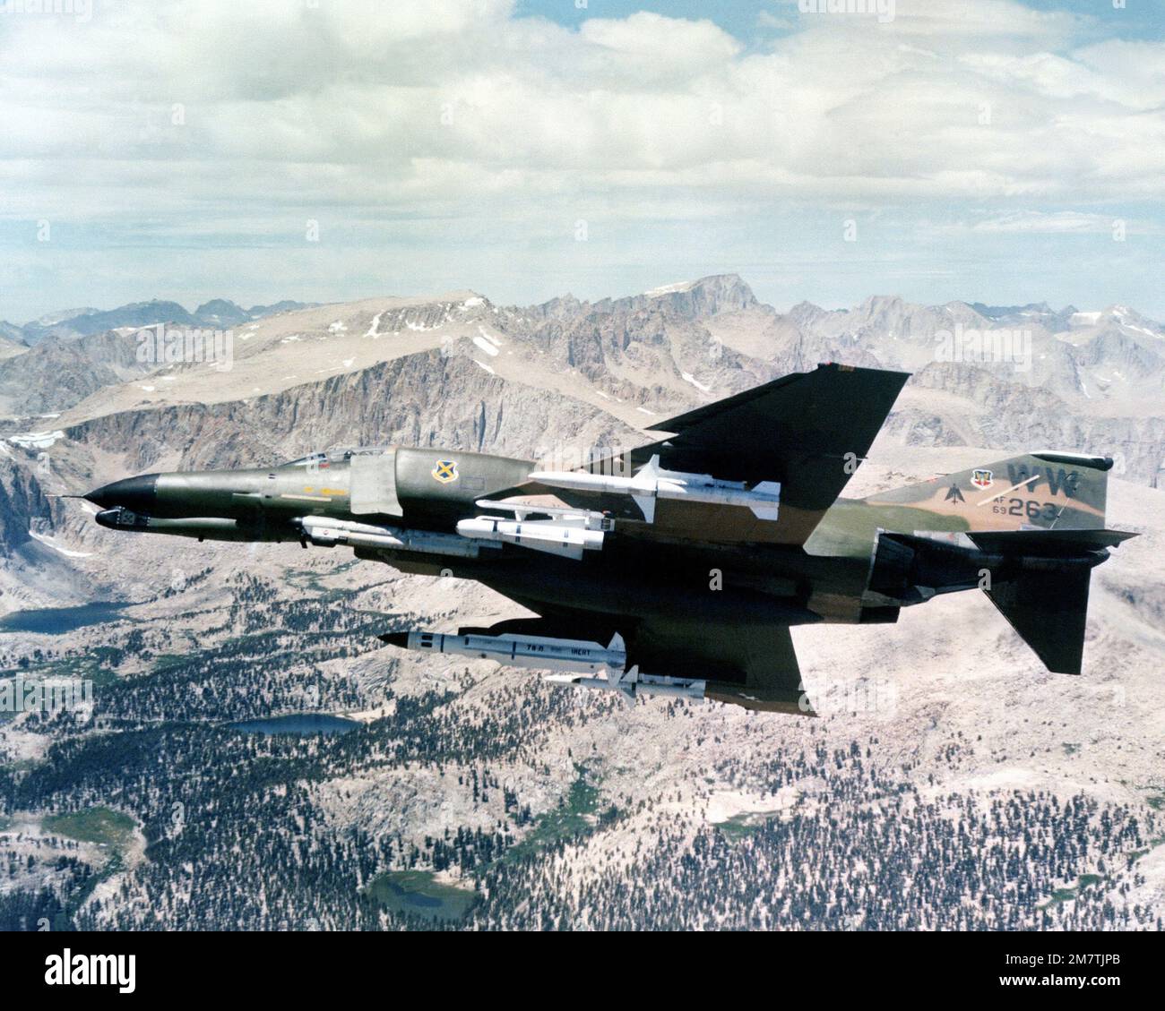 An F-4G Phantom II aircraft shows its undercarriage holding four ...