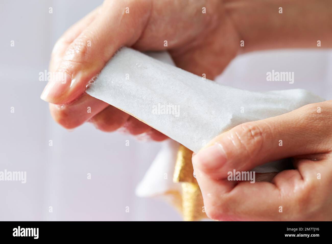 Pull the mask pack by hand Stock Photo - Alamy