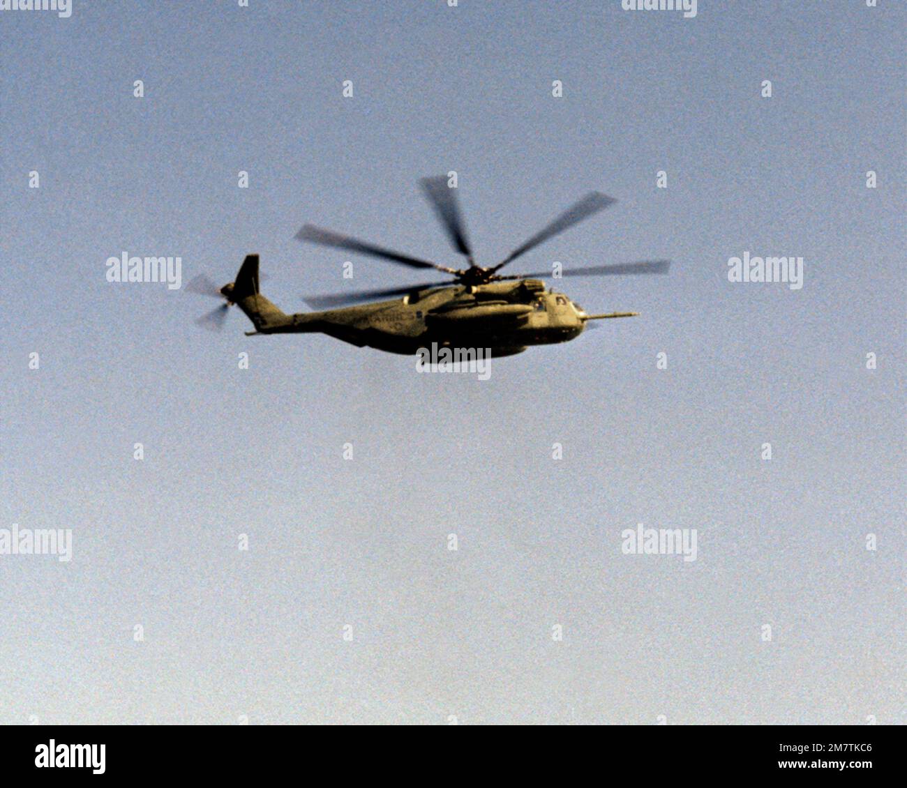 A right side view of a CH-53E Super Stallion helicopter equipped with ...