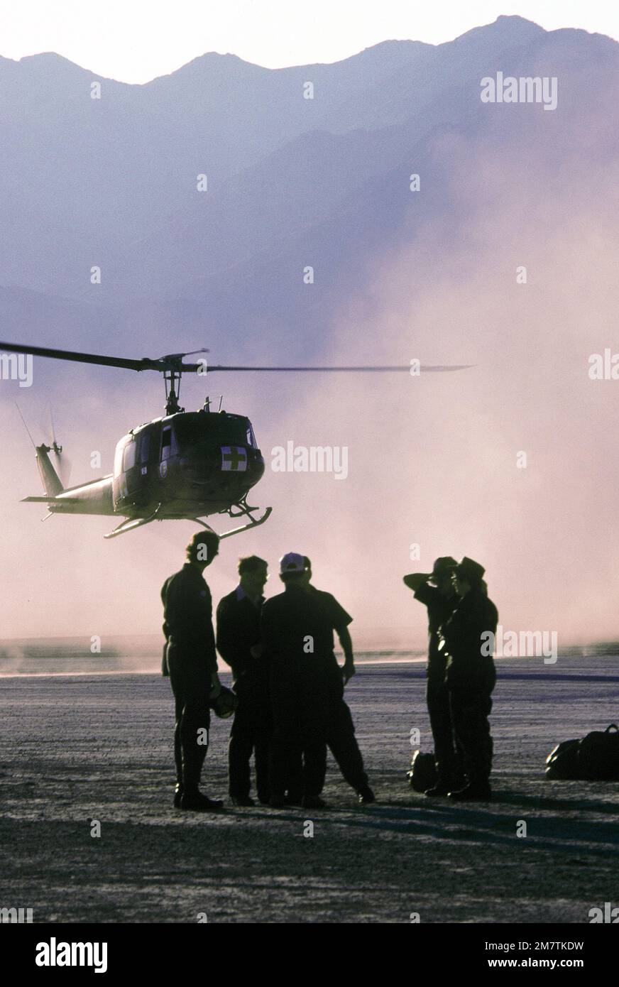 An Army UH-1 Iroquois helicopter, with acting patients aboard, arrives ...