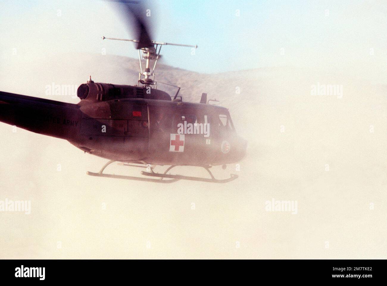 An Army UH-1 Iroquois helicopter, with acting patients aboard, arrives ...
