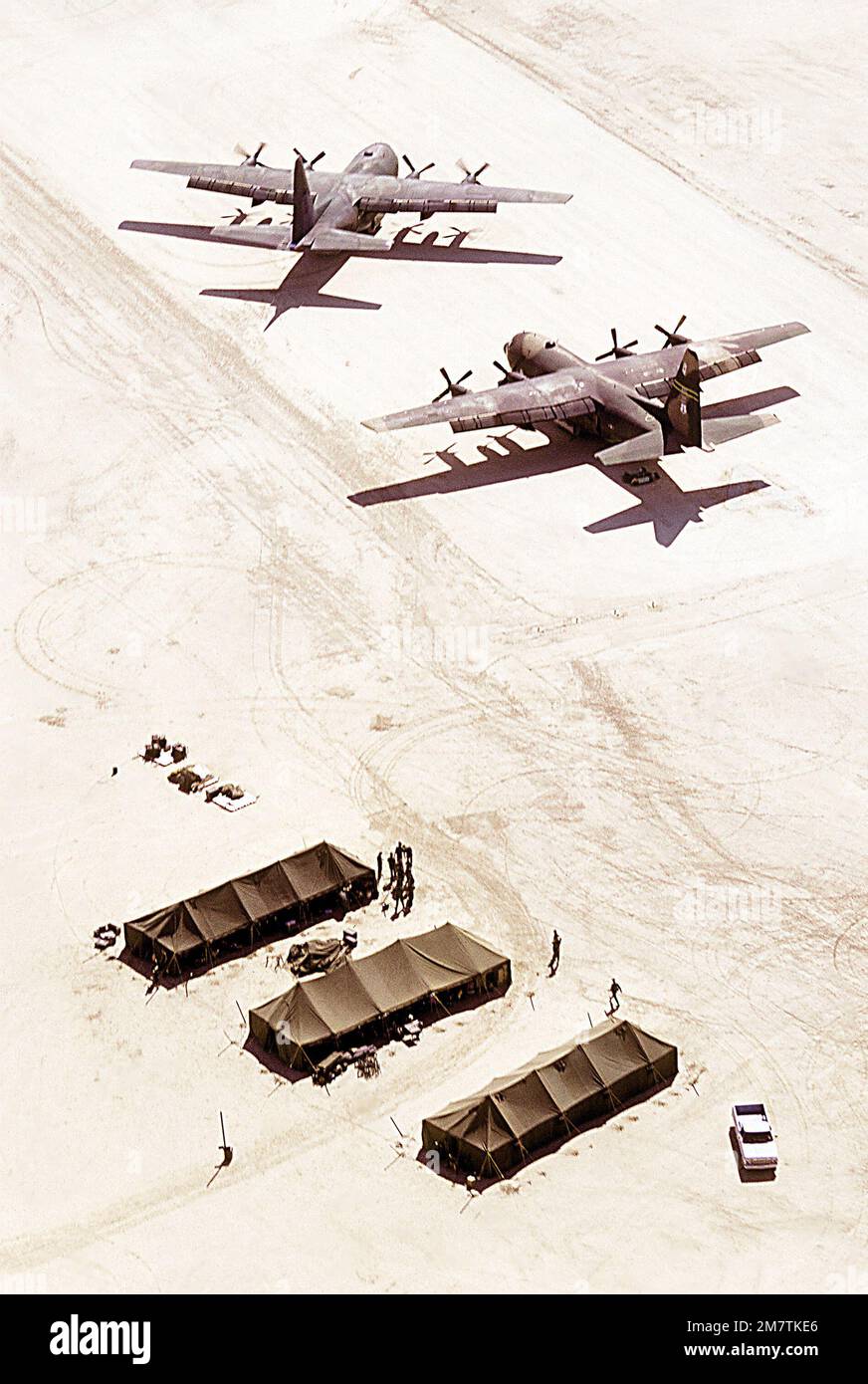 An aerial view of an air transportable hospital and two C-130 Hercules ...