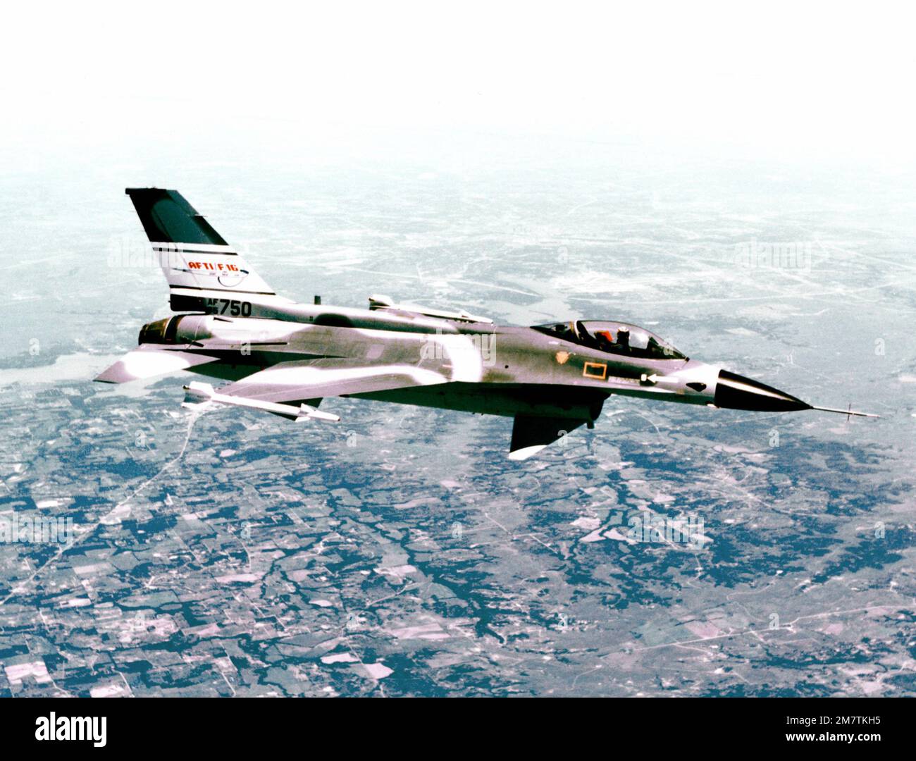 An air-to-air right side view of an F-16A Advanced Fighter Technology ...