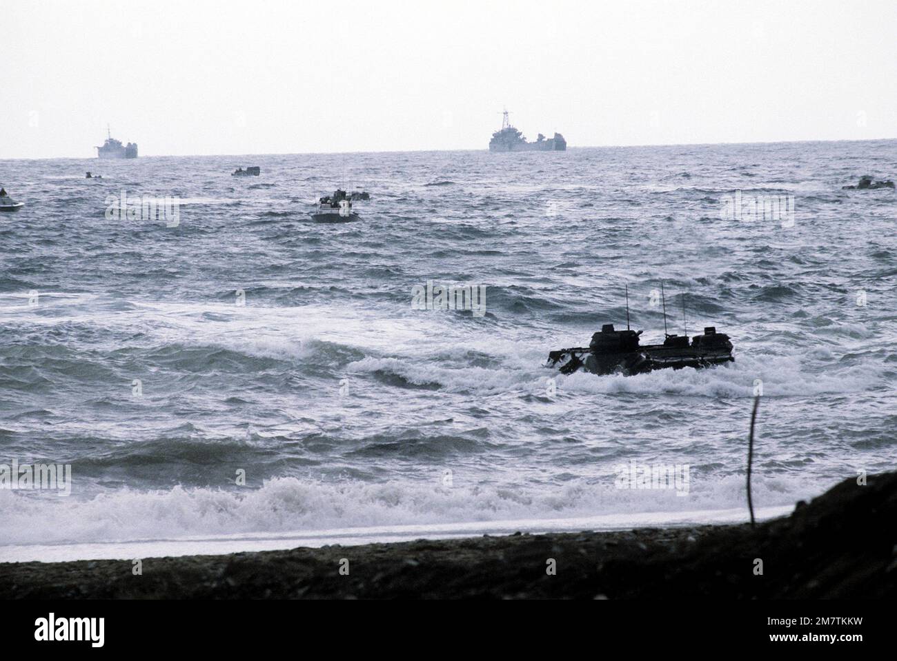 A U.S. Marine Corps tracked landing vehicle (LVTP-7) lands during ...