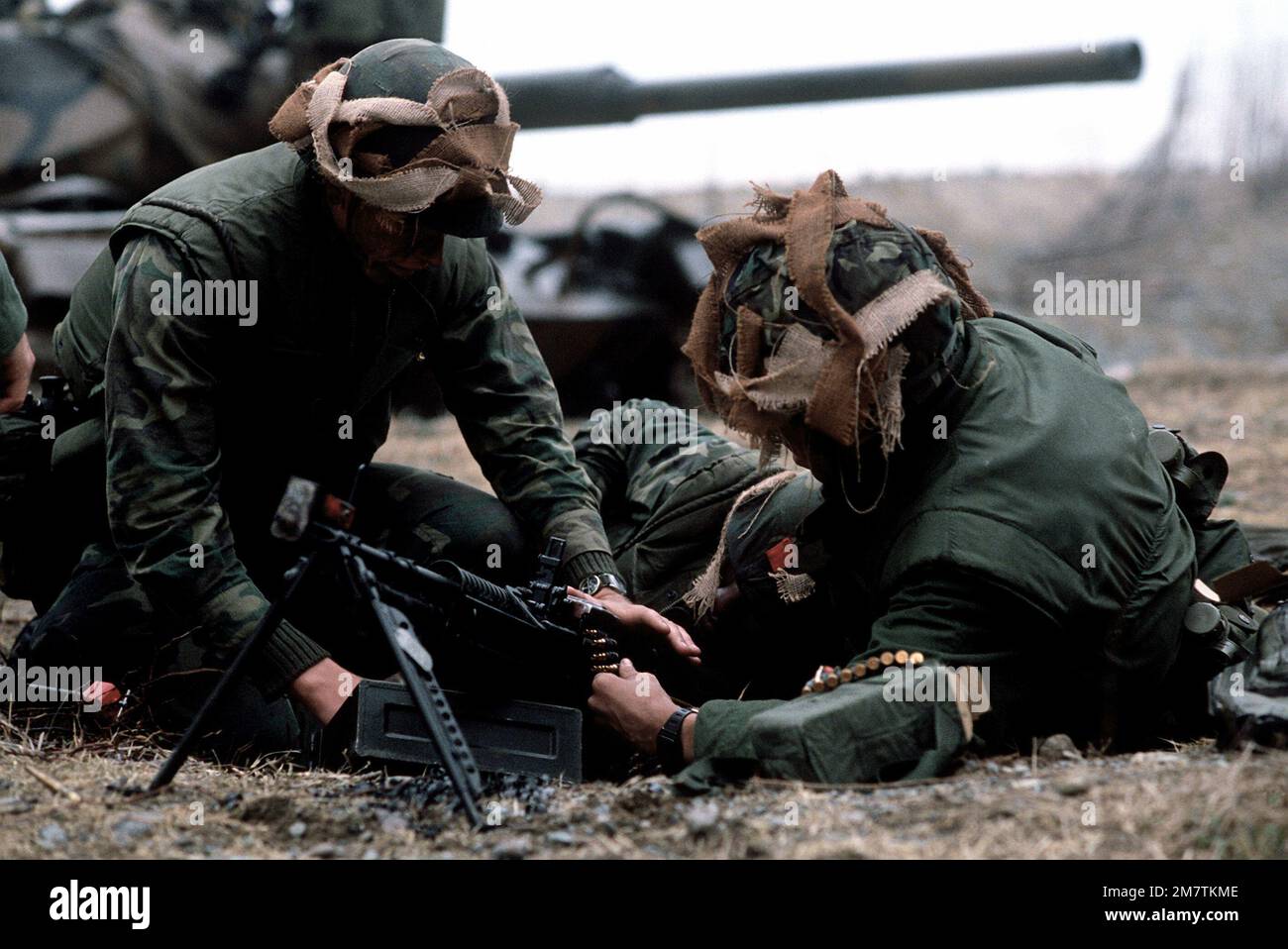 U.S. Marines load an M-60 machine gun during Valiant Blitz, the ...