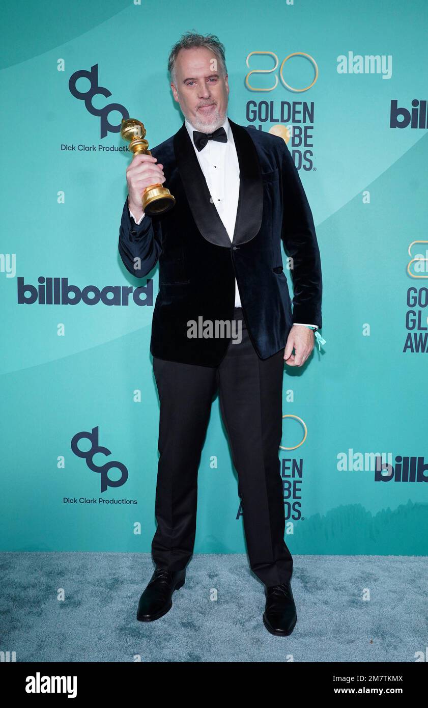 Mark Gustafson poses with the award for best motion picture, animated ...