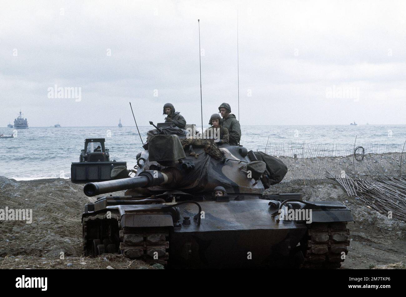 U.S. Marines, aboard an M-60A1 tank, land during Valiant Blitz, the ...