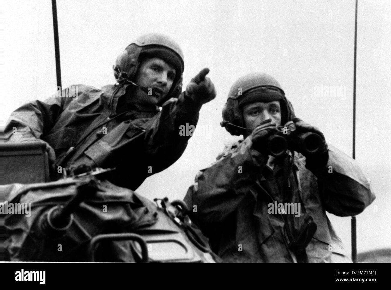 Tank commander SGT Bart Danby, 9th Marine Amphibious Brigade, points ...