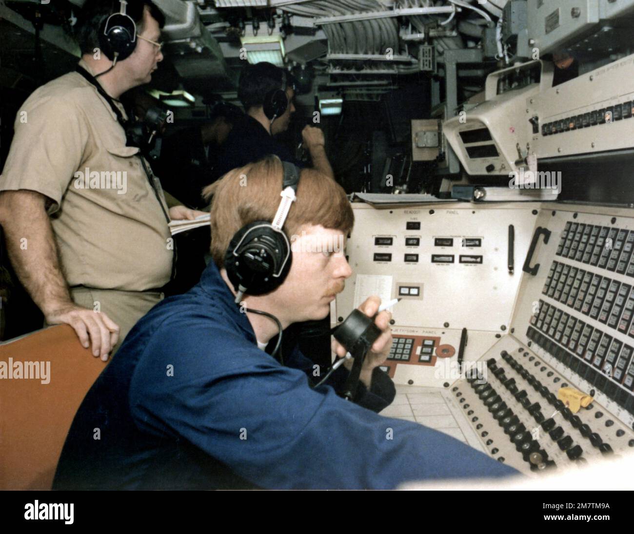 CHIEF Missile Technician Martin Nagle sites at a control board in the ...