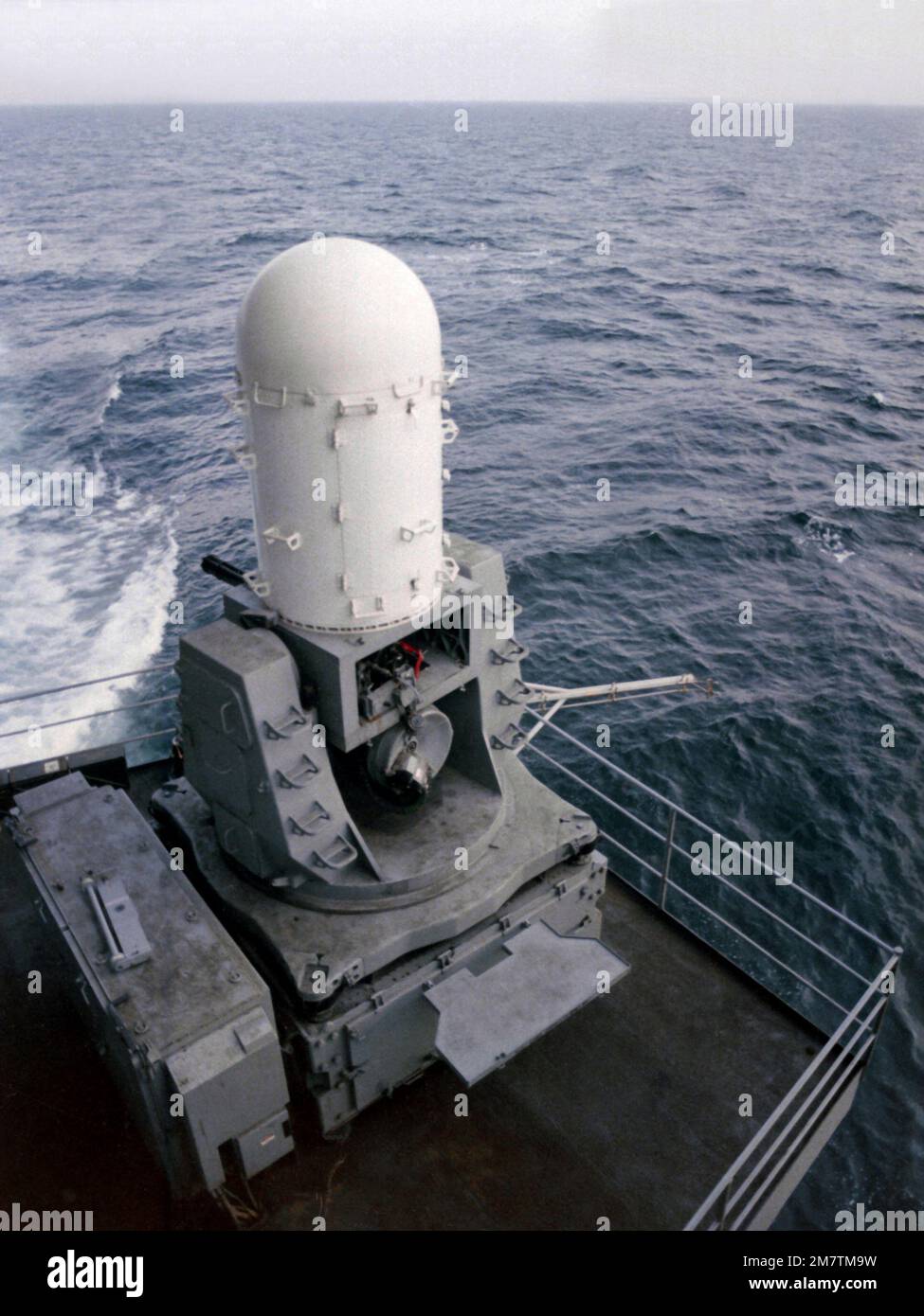 A rear view of one of the three Phalanx Mark 15 (3X1) weapons systems ...