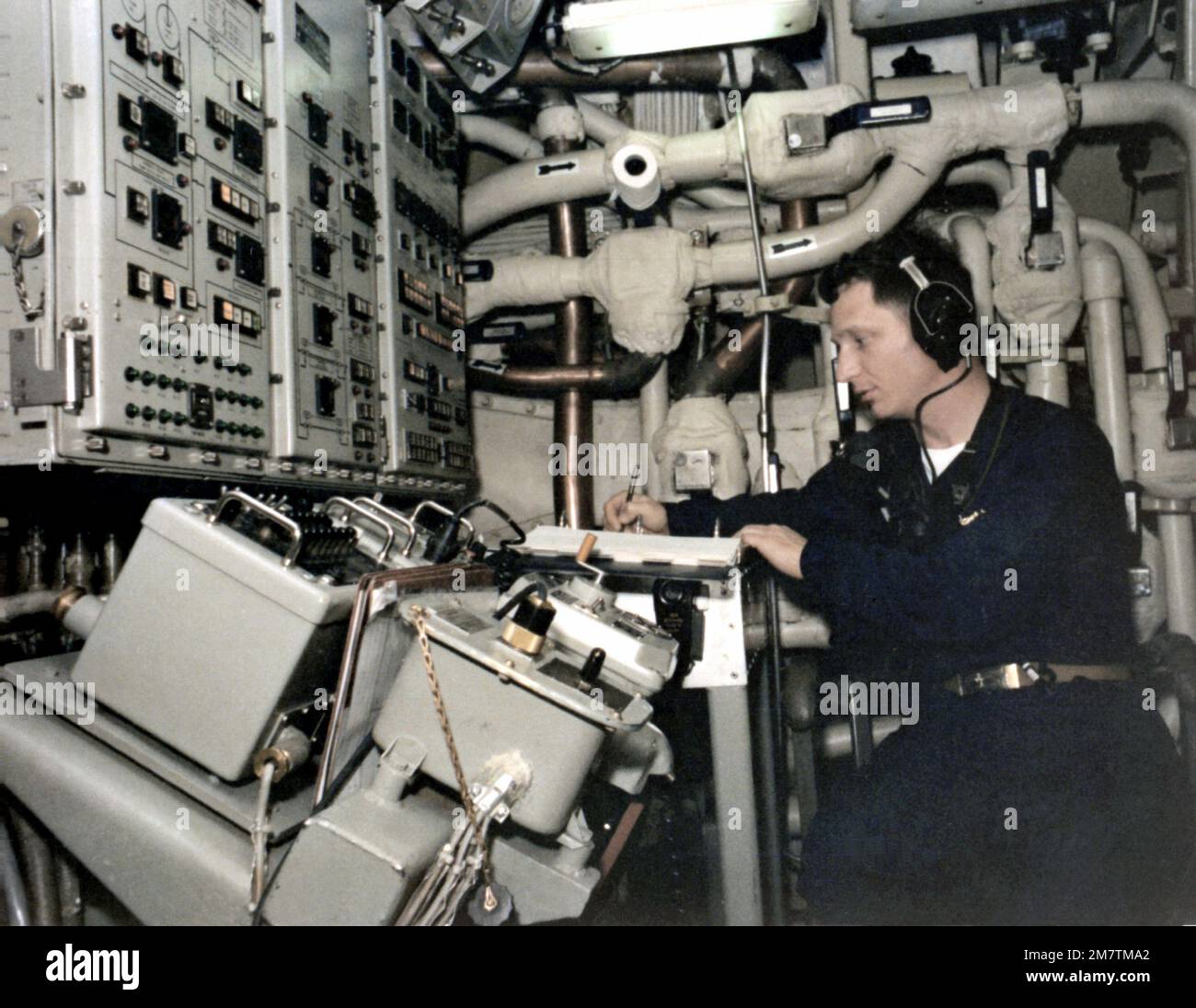 LT. Robert Pornaras mans the missile compartment control and monitoring ...
