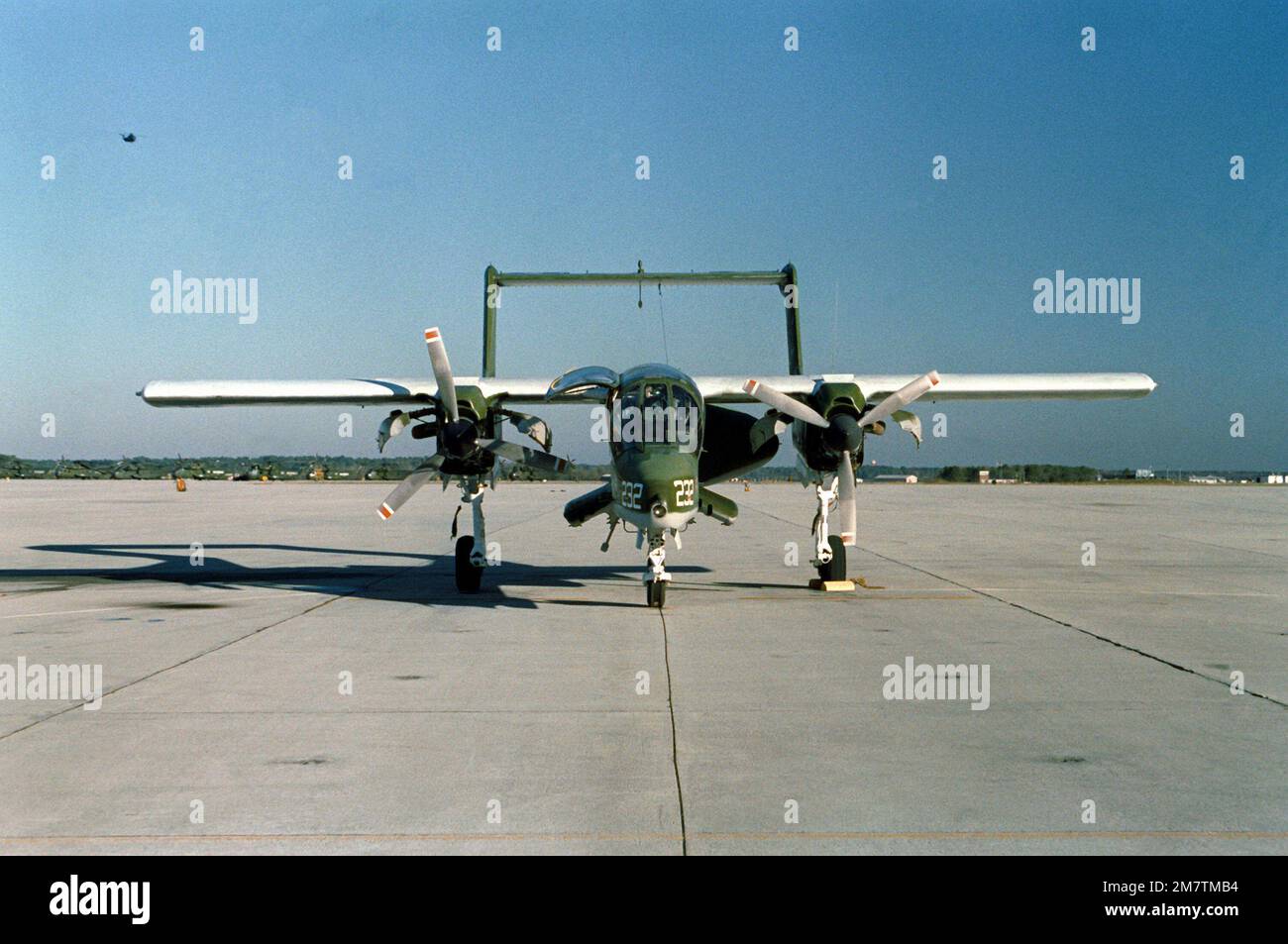 A head-on view of a Marine OV-10A Bronco aircraft on the flight line ...