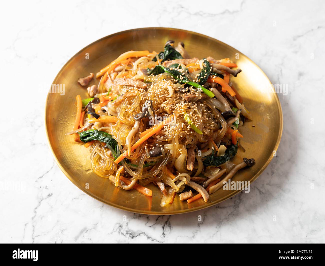 japchae, mixed dish of boiled bean threads, stir-fried vegetables, and ...