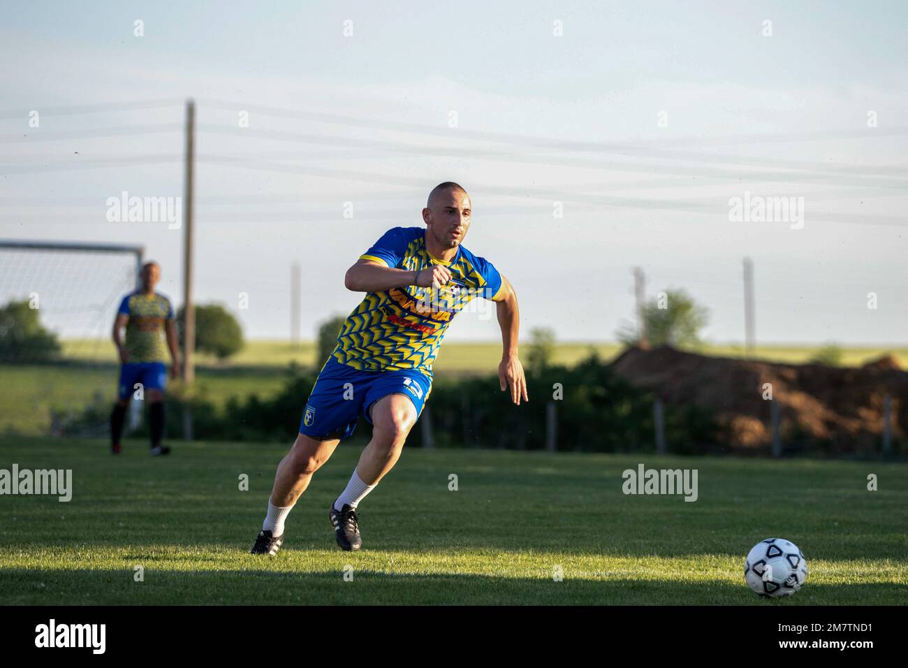 A Bulgarian player dribbles the ball down the field during a soccer ...