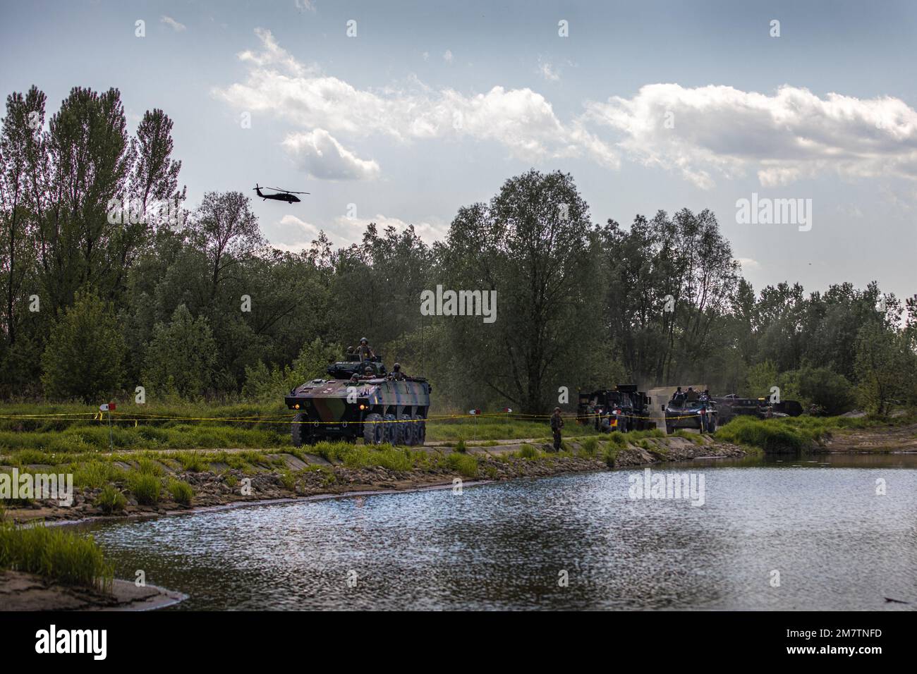 NATO allies conduct a wet-gap crossing operation as part of Defender ...