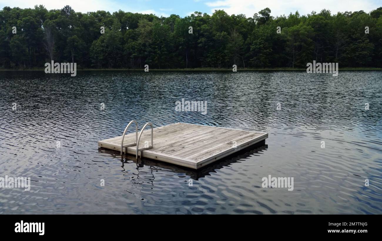 A scenic view of a floating wooden dock located on the surface of a ...