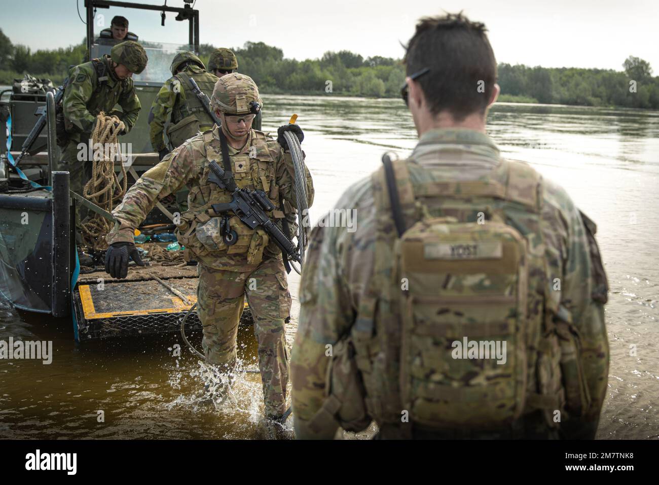 NATO allies conduct a wet-gap crossing operation as part of Defender ...