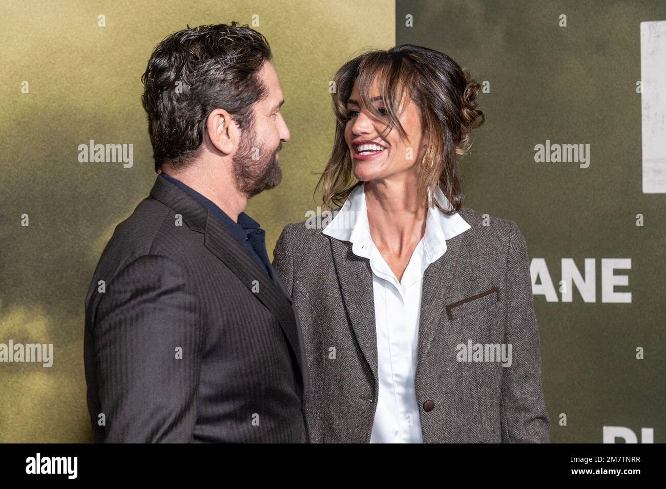Gerard Butler and Morgan Brown attend the "Plane" New York premiere at ...