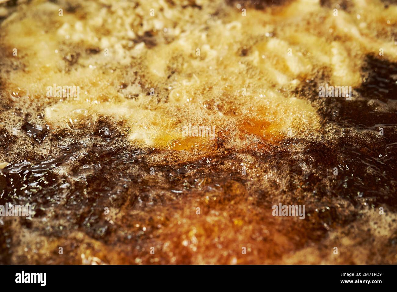 food being fried in oil Stock Photo - Alamy