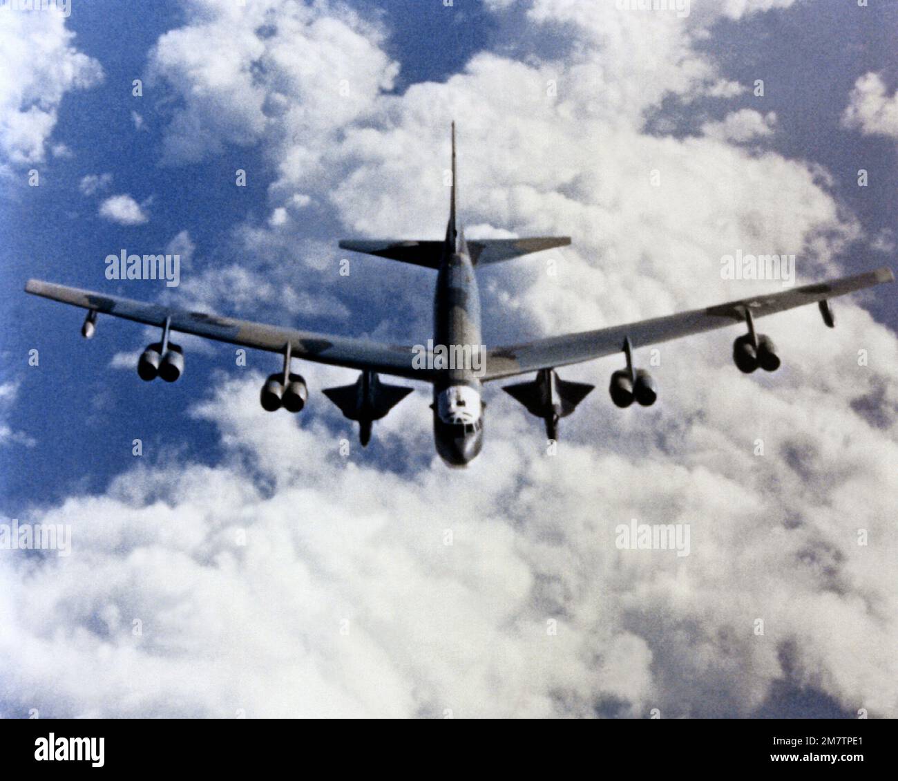 A high angle front view of a B-52H Stratofortress aircraft carrying a ...