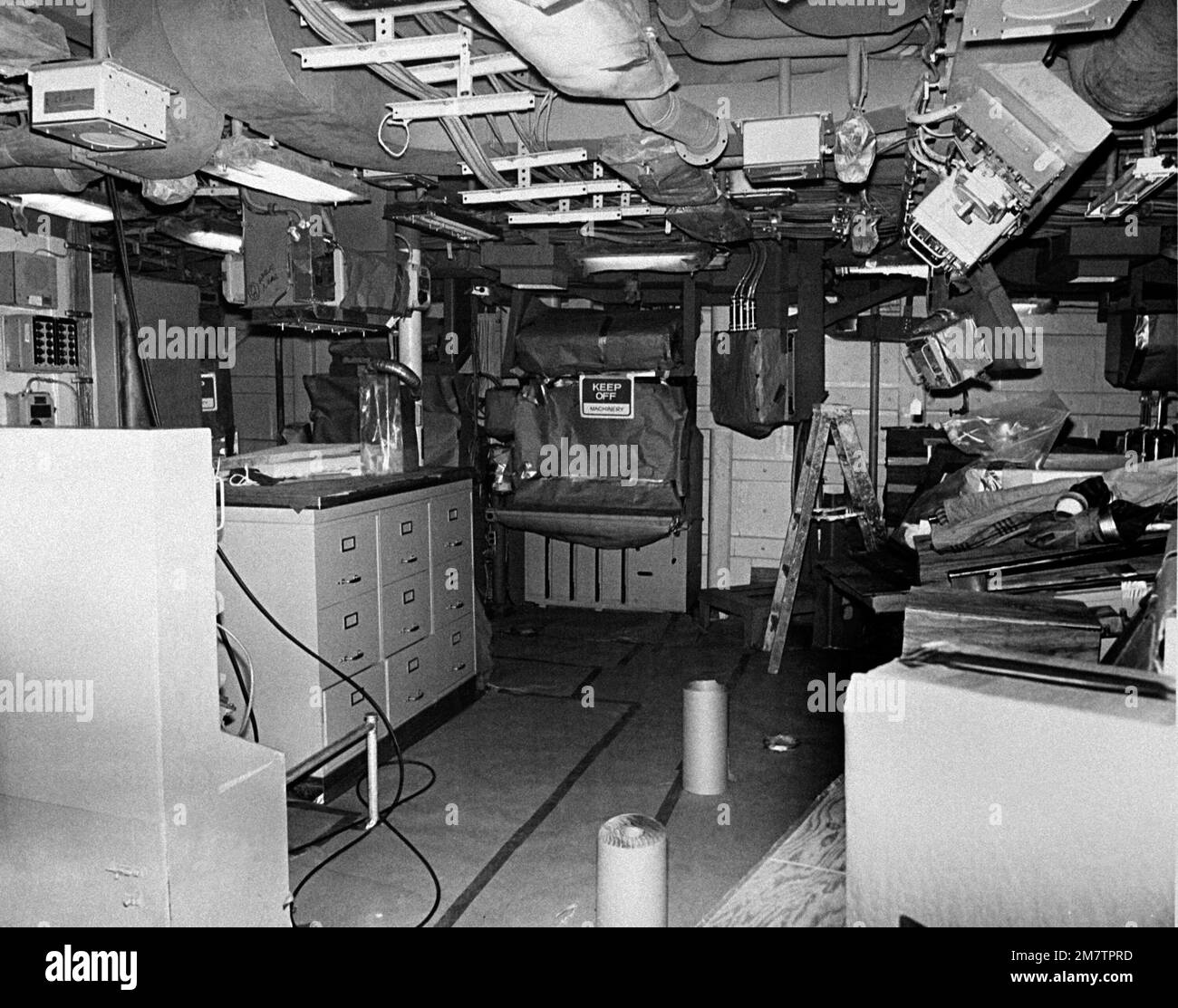 An interior view of the combat information center on the guided missile ...