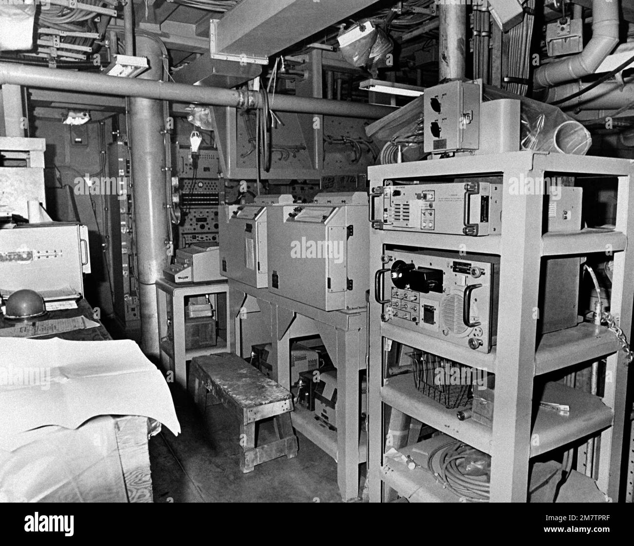 An interior view of the communications center on the guided missile ...