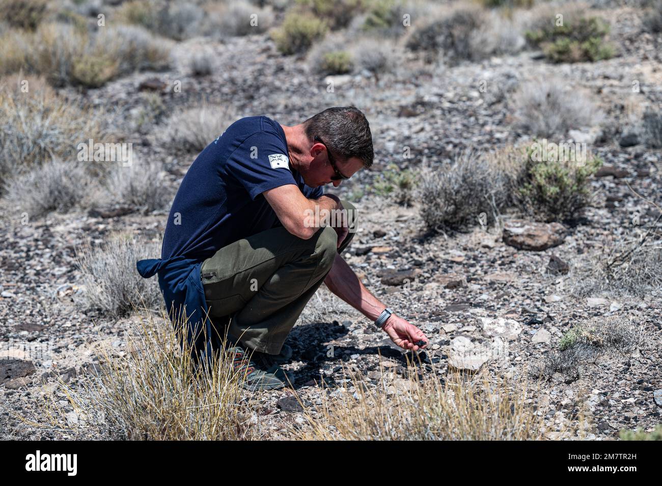 Colonel Todd Dyer, Commander of the 99th Air Base Wing, inspects a ...