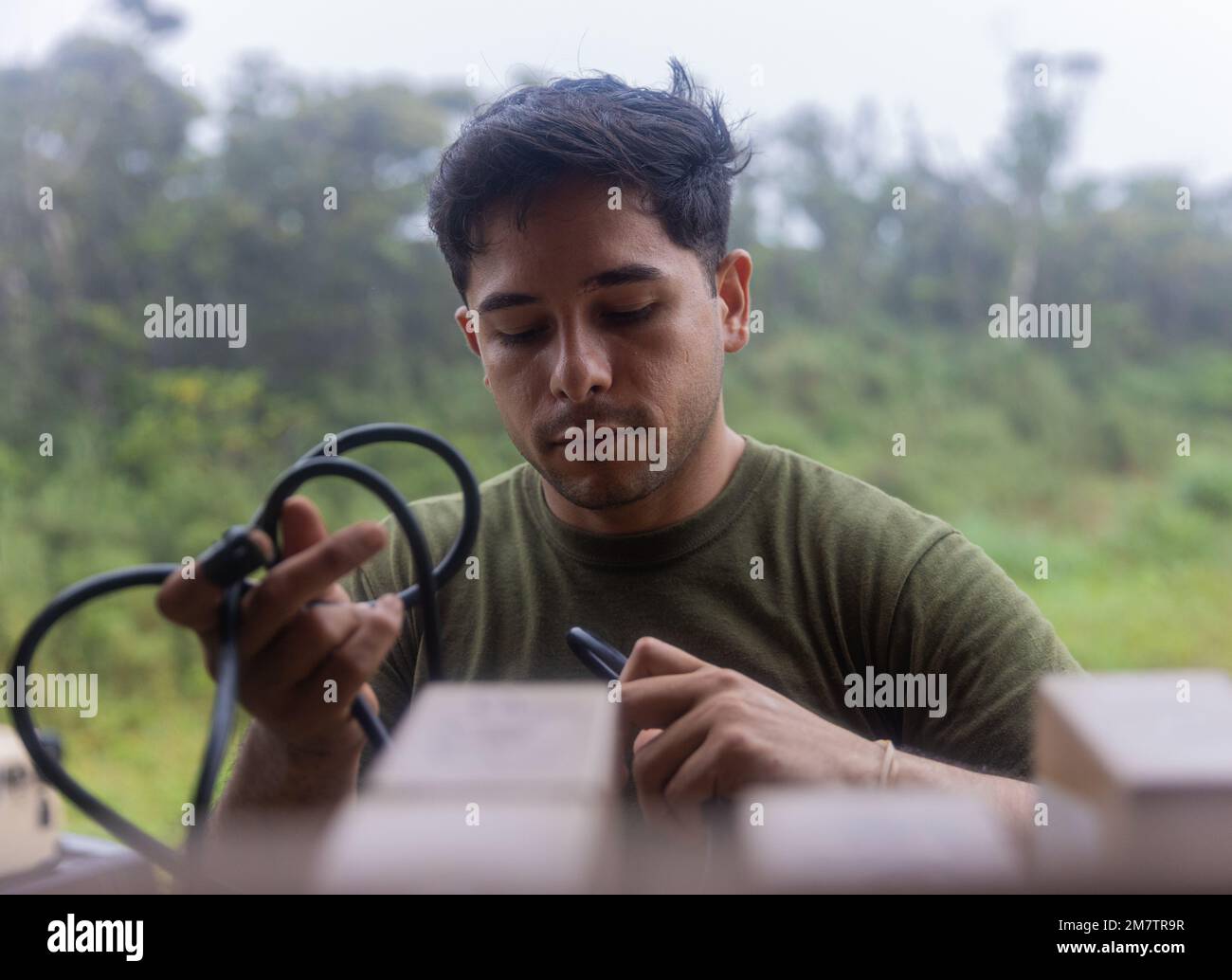 U.S. Marine Corps Sgt. Alex Ruelas, a field radio operatior with the ...