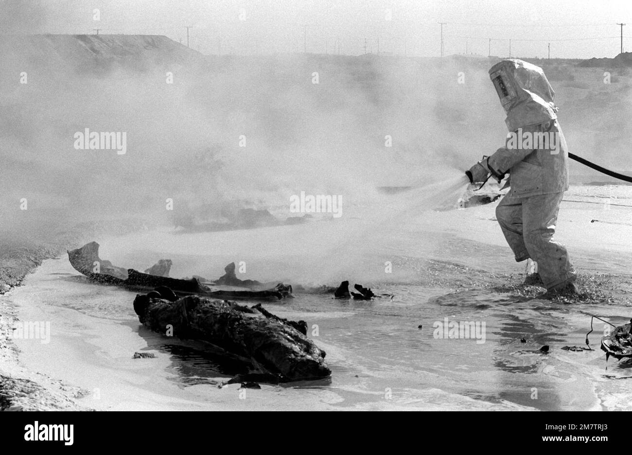 Hosing down a fire Black and White Stock Photos & Images - Alamy