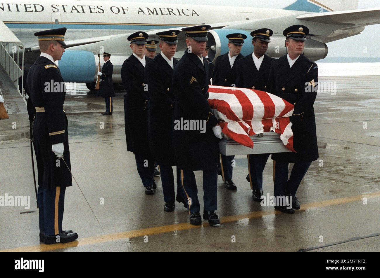 The body of Army LCOL Charles Ray is being carried from a VC-137 ...