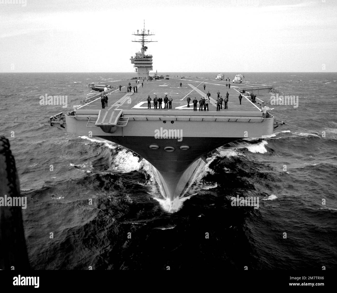 An aerial bow-on view of the nuclear-powered aircraft carrier CARL ...