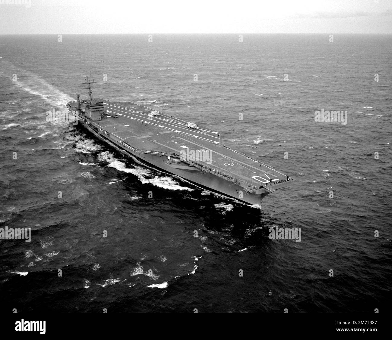 A starboard bow view of the nuclear-powered aircraft carrier CARL ...
