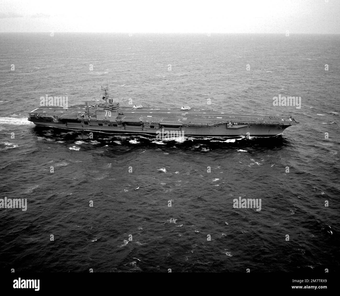 An aerial starboard beam view of the nuclear-powered aircraft carrier ...