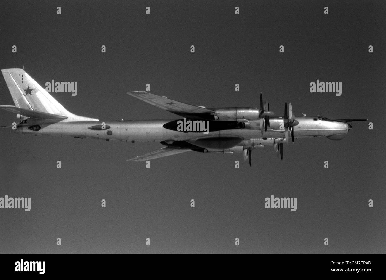 An air-to-air right side view of a Soviet Tu-95 Bear aircraft about 42 ...