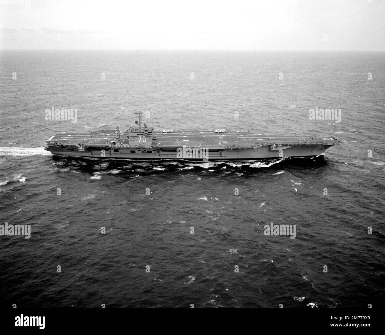 An aerial starboard beam view of the nuclear-powered aircraft carrier ...